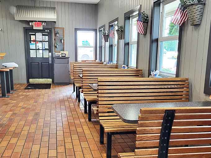 Comfortable booth seating invites lingering conversations &ndash; because the only thing better than eating donuts is eating donuts while judging people walking by.