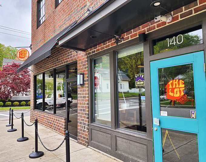 The Lot Beer Co.'s inviting turquoise door promises craft brews and good conversation inside this brick building that's become a local gathering spot.
