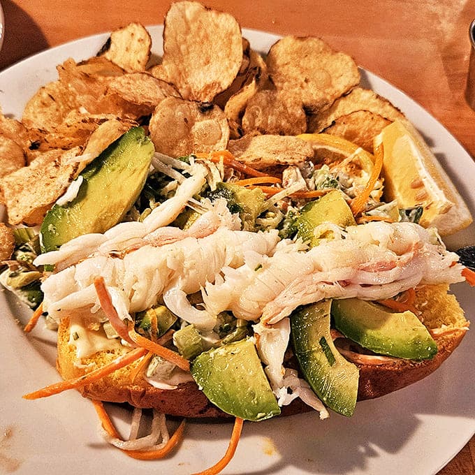 This lobster roll doesn't skimp on the star ingredient&mdash;chunks of sweet meat nestled in buttery goodness with house-made chips.