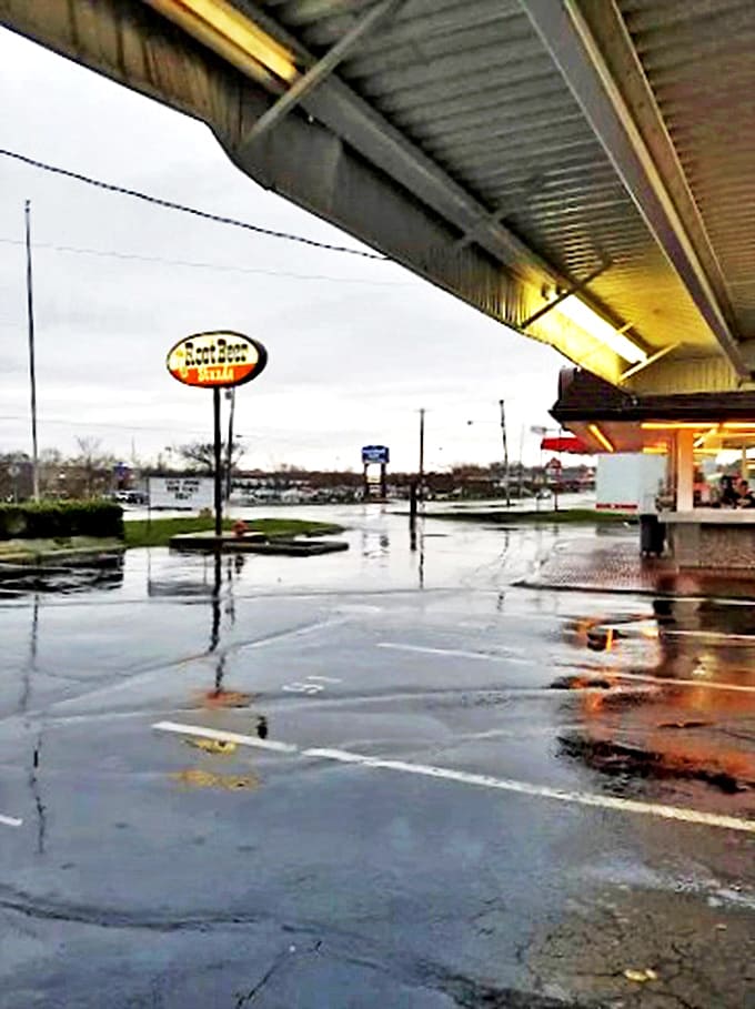The iconic sign stands proud against any weather, promising comfort food and frosty mugs to anyone wise enough to follow its call.