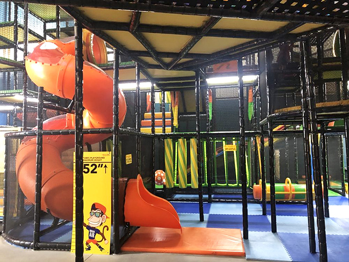 The toddler play area proves that adventure has no minimum age requirement, just smaller equipment and more colorful padding.