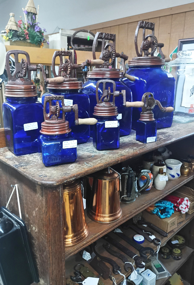 These blue glass Dazey butter churns transform kitchen labor into art, their cobalt beauty making you almost wish you had to make butter by hand. Almost.