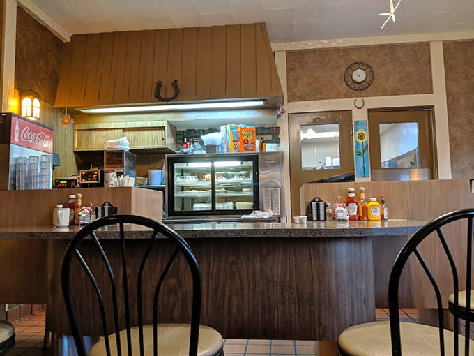 The counter offers front-row seats to the breakfast show, where coffee flows freely and regulars exchange news of the day.