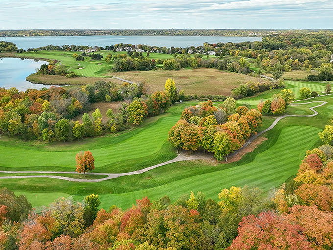 Wild Marsh Golf Club showcases Buffalo's natural beauty with meticulously maintained fairways set against Minnesota's stunning fall foliage.