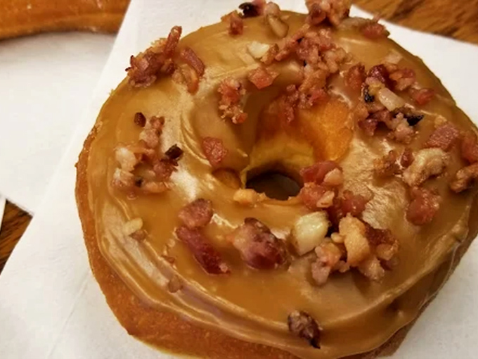 The maple bacon donut &ndash; where breakfast foods unite in perfect harmony, proving that sweet and savory is the power couple of flavors.