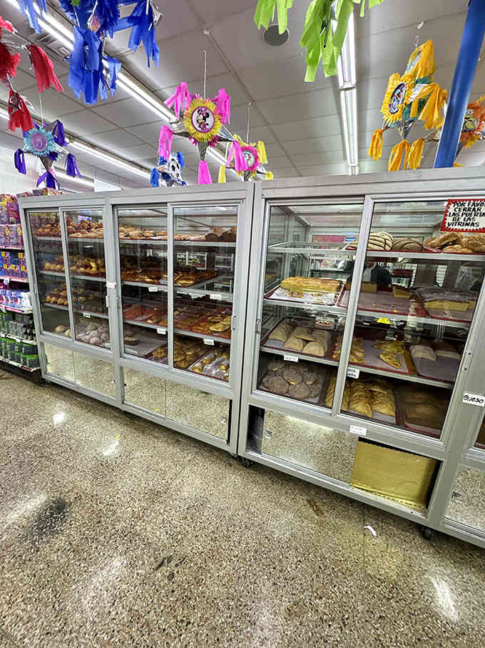 Behind glass doors lies a wonderland of Mexican pastries &ndash; from sugar-dusted conchas to glistening empanadas, each promising sweet comfort.