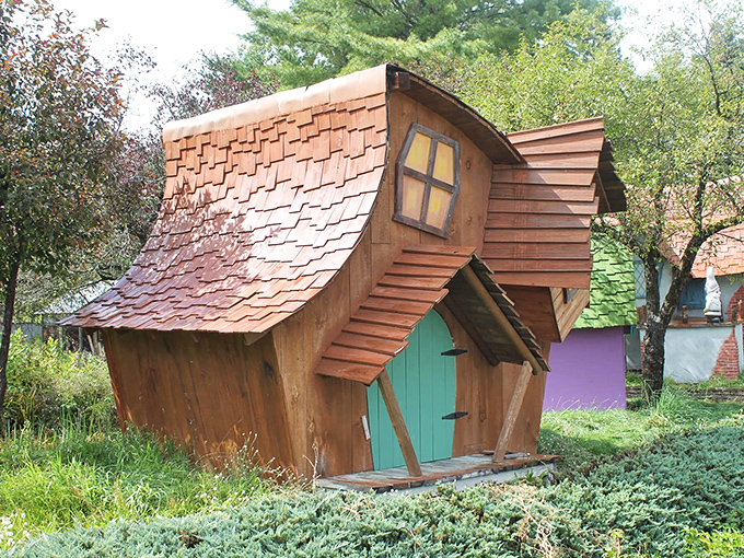 This wooden wonder with its green door looks like it might house Wolverine's most industrious gnome craftsman.