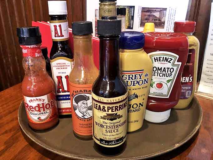 The condiment carousel &ndash; that unsung hero of tavern dining where customization is king and the perfect sauce awaits your culinary inspiration.