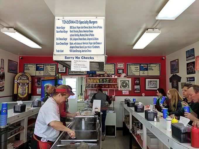 Organized chaos at its finest. The bustling counter scene at Tendermaid is like watching a well-choreographed dance where loose meat sandwiches are the prima ballerinas.