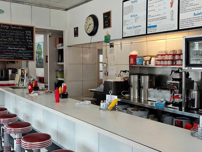 The counter view reveals the heart of operations &ndash; where coffee flows freely, and servers seem to have ESP about your empty cup.