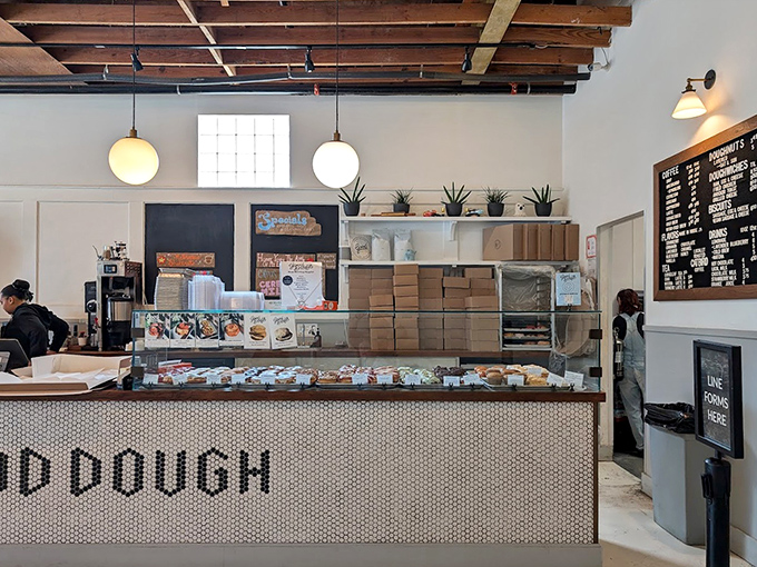 Behind this tiled counter, magic happens daily &ndash; boxes stacked high, ready for the morning rush of donut enthusiasts seeking their fix.