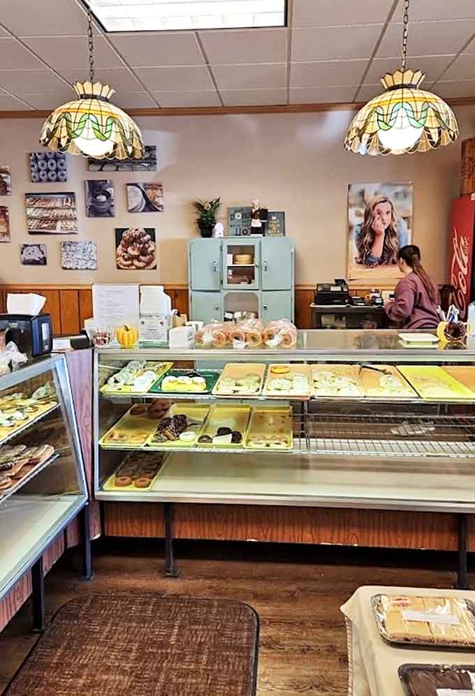 The bakery counter, where dreams come true and diets go to die. That vintage mint cabinet adds the perfect touch of nostalgia.