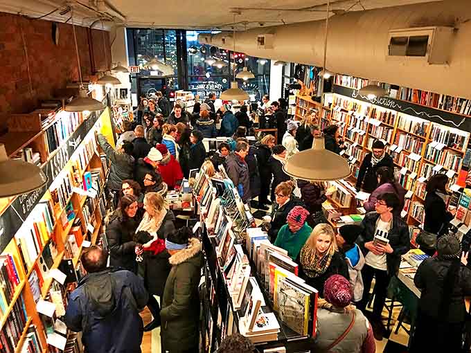 The moment of decision at El Sazon &ndash; studying the menu board while anticipating the flavor journey that awaits.