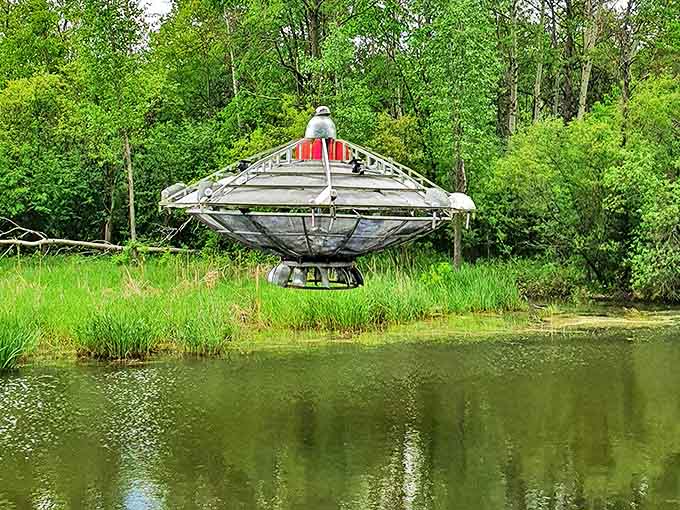 "E.T., phone Minnesota!" This hovering UFO reflects perfectly in the pond below, creating twice the extraterrestrial wonder for visitors.