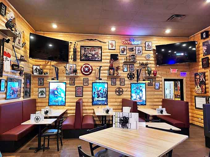 Comfortable booths line the walls beneath an impressive collection of memorabilia, inviting guests to settle in for a feature-length meal.