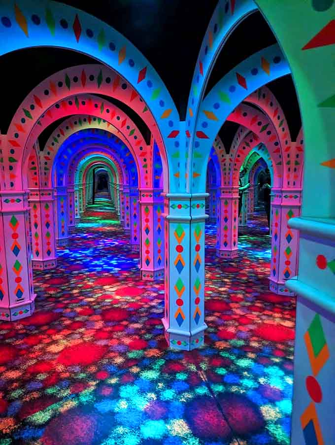 The maze's interior creates a carnival of colors underfoot, like walking through a kaleidoscope that someone turned up to eleven.