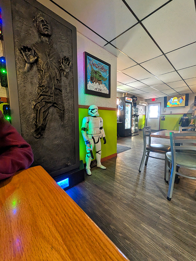 Han Solo in carbonite watches over diners, his frozen expression seemingly approving of your menu choices.