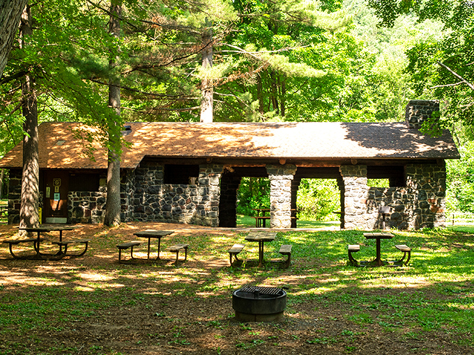 This stone pavilion has sheltered generations of nature lovers, its rustic charm perfectly complementing the wilderness that surrounds it.
