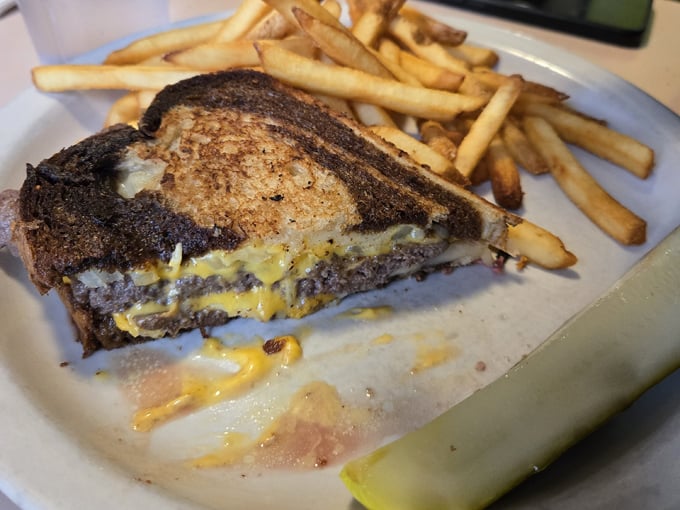 Frank's exterior might be humble, but those outdoor tables have hosted countless conversations and coffee refills through Wisconsin's summer days.