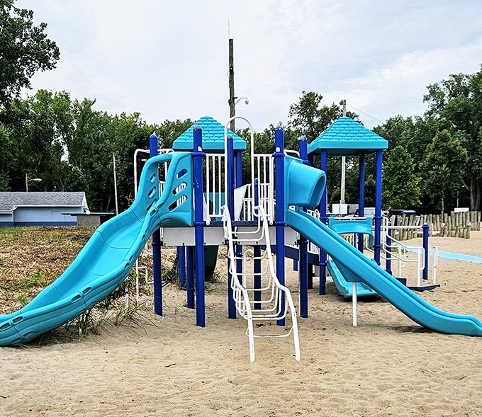 The colorful playground offers little ones a break from sandcastle construction, with lake views parents can enjoy too.