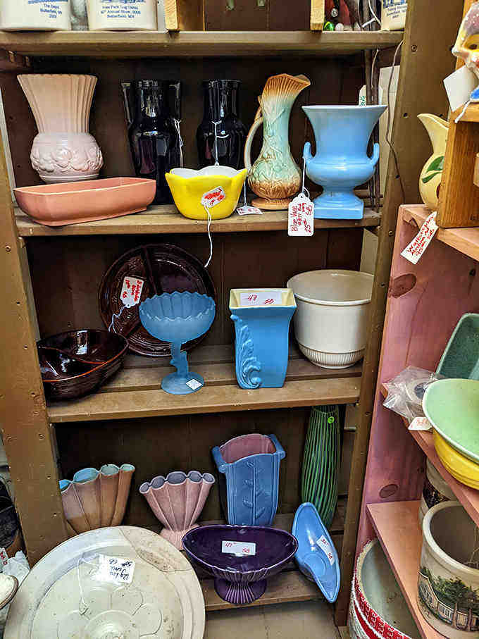 A rainbow of vintage pottery transforms ordinary shelves into an artist's palette, with mid-century designs that bring warmth and character to modern homes.