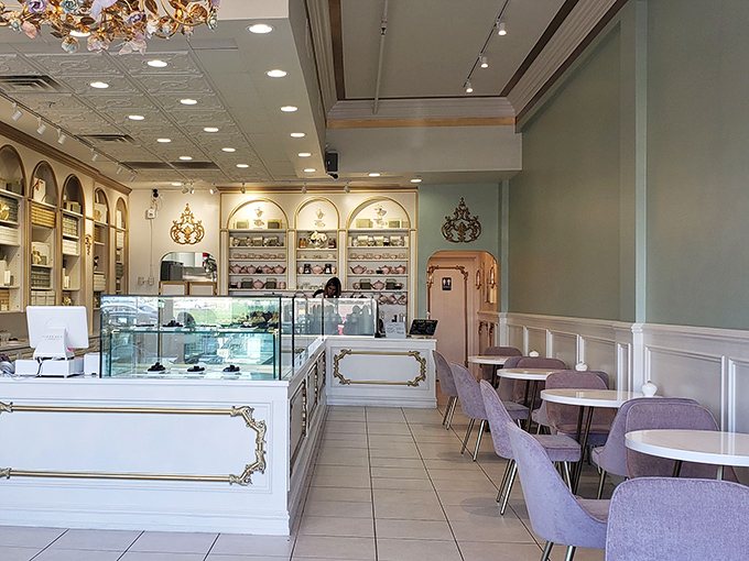 Lavender chairs and marble tables create a pastel paradise where even the most serious adults find themselves giggling with dessert-induced happiness.