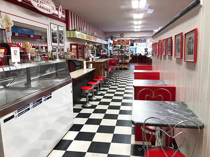 The classic diner-style seating area invites you to linger over ice cream treats while admiring walls adorned with local history.
