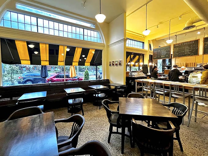 The seating area where time slows down and sticky bun consumption speeds up, creating perfect breakfast equilibrium.