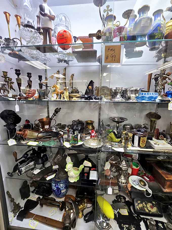 Tiny treasures fill this display case &ndash; the kind of small collectibles that make visitors press their noses to the glass like kids at a candy store.