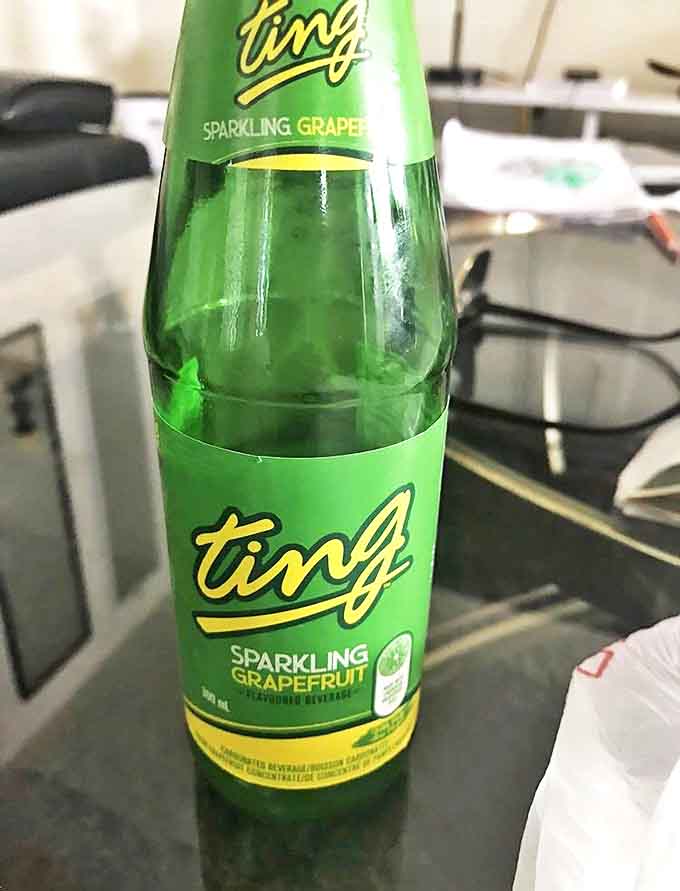 A bottle of Ting grapefruit soda &ndash; the unofficial national beverage of Jamaica &ndash; offers bright, citrusy refreshment that cuts through rich island flavors.