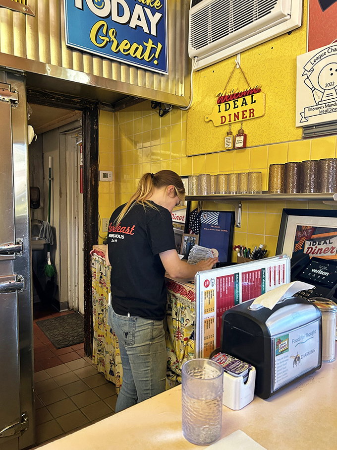 "Make Today Great!" proclaims the sign above the kitchen – the kind of simple, earnest encouragement that defines the Ideal Diner experience.