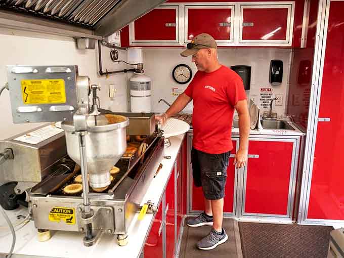 The donut maestro at work &ndash; crafting each batch with the focus of a surgeon and the soul of an artist.