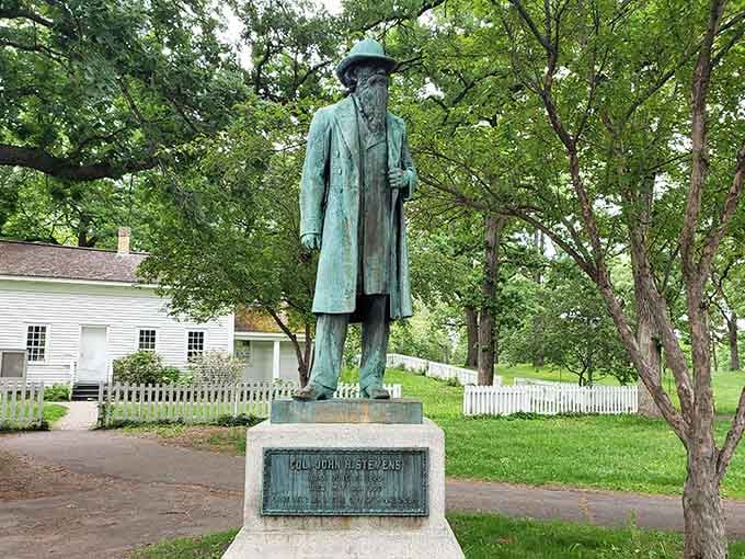 This bronze sculpture depicts Hiawatha and Minnehaha from Longfellow's famous poem – literary history brought to life among the trees.