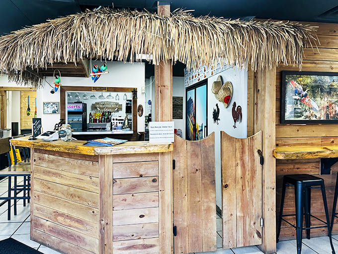 The tiki-inspired bar area brings vacation vibes with its thatched roof and wooden details – just add a mojito for the full experience.