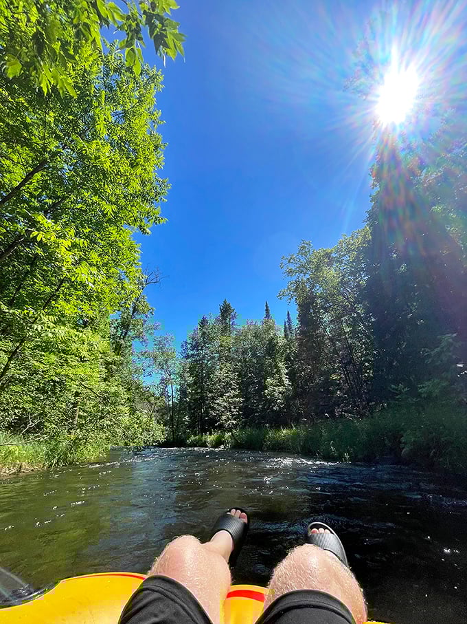 Looking up at Minnesota's perfect blue sky from river level offers a perspective worth every minute spent floating.