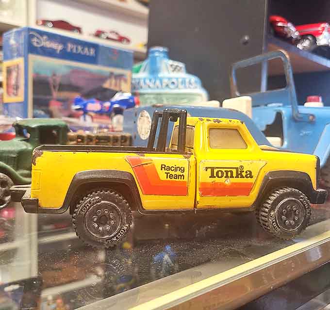 This yellow Tonka Racing Team truck isn't just a toy &ndash; it's someone's childhood afternoon spent creating elaborate construction sites in backyard dirt.