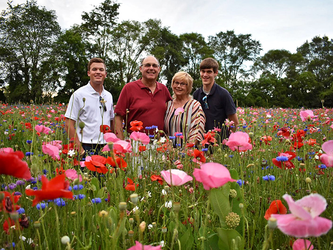 Family memories bloom eternal against this spectacular backdrop, where generations gather to share moments of natural wonder together.