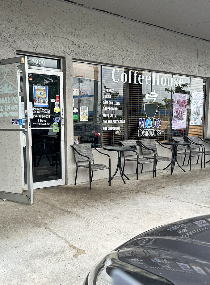 The coffee house entrance offers a moment of calm before the sweet storm &ndash; metal chairs patiently waiting for the next sugar pilgrimage.