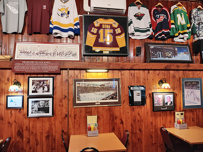 A shrine to Minnesota sports history &ndash; hockey jerseys and memorabilia create a museum-like atmosphere that celebrates local pride.