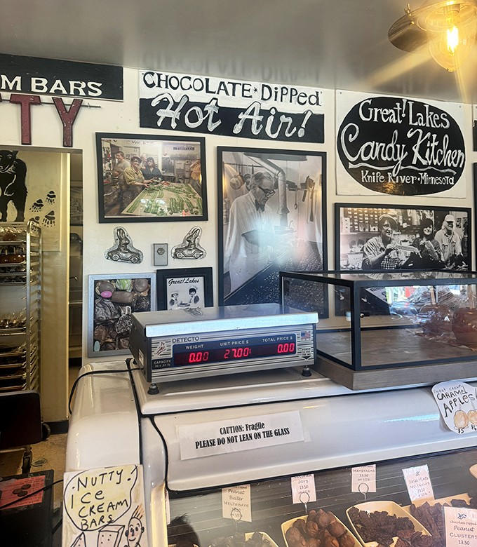 The vintage scale and handwritten signs reflect the shop's commitment to old-fashioned quality over mass production.