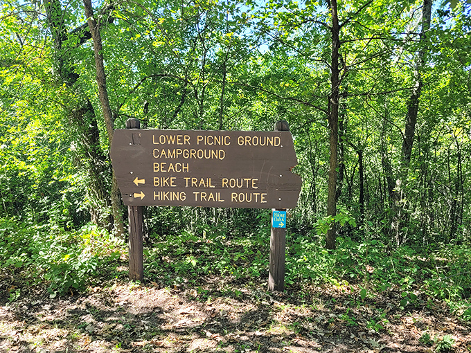 Trail signs point the way to adventure, promising beaches, bike routes and hiking paths for explorers of all ages.