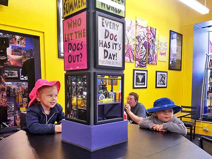 Customers: Young explorers scout their surroundings with wide-eyed wonder &ndash; the next generation of comic enthusiasts discovering their headquarters.