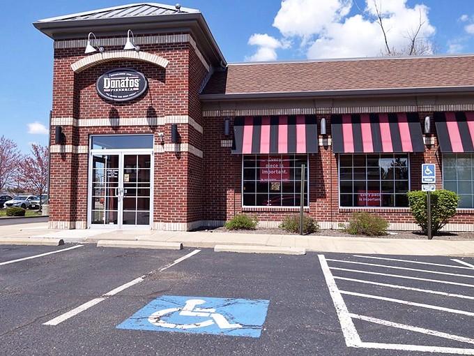 Donatos brings its edge-to-edge pizza philosophy to Hudson, because even charming towns need reliable pizza options for lazy dinner nights.