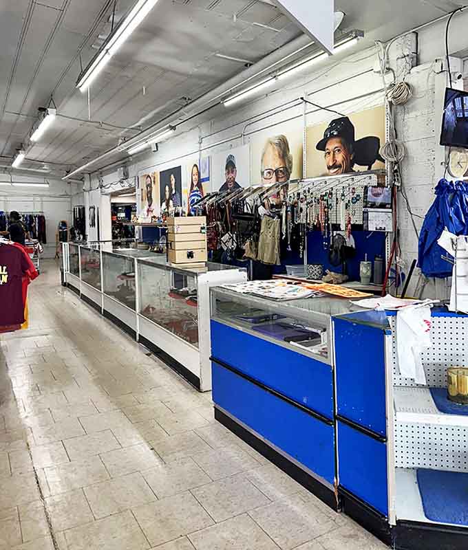 The checkout counter area showcases the mission behind the merchandise &ndash; community support through sustainable shopping.