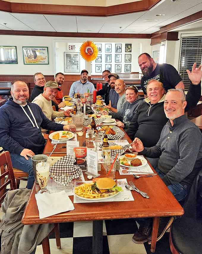A gathering of friends enjoying what matters most &ndash; good food, better company, and the shared understanding that calories don't count in diners.