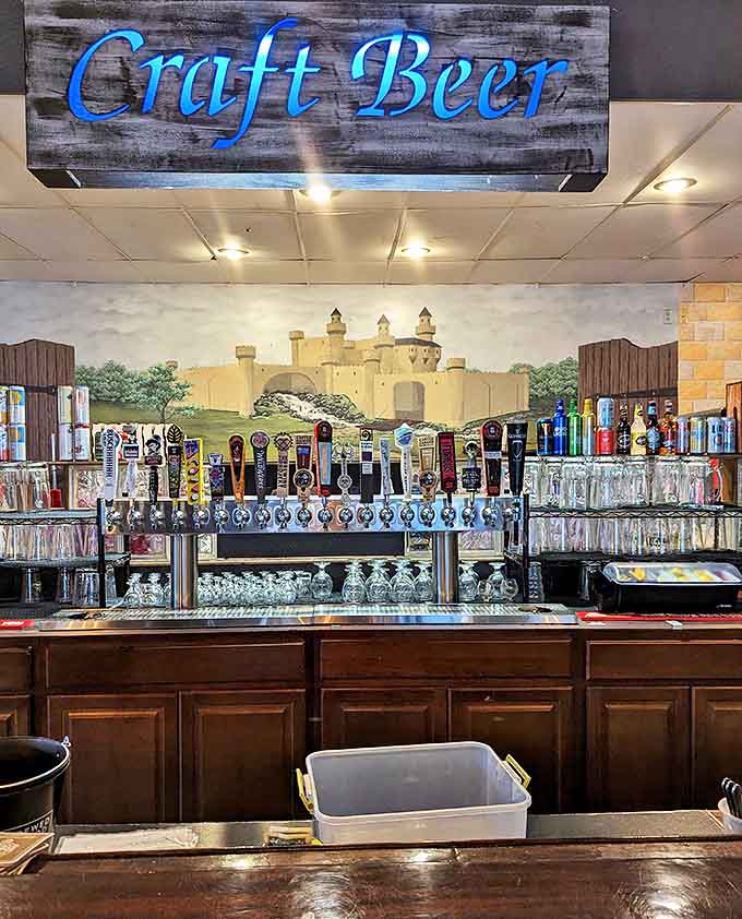 Behind the bar, a castle mural watches over craft beer taps, where local Minnesota brews flow alongside carefully selected national favorites.