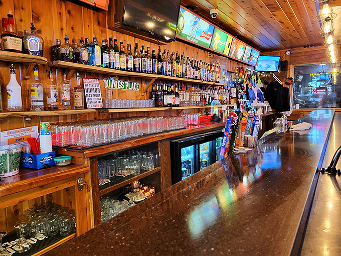 The impressive bar at King's Place stands ready to quench your thirst with local brews and classic cocktails.