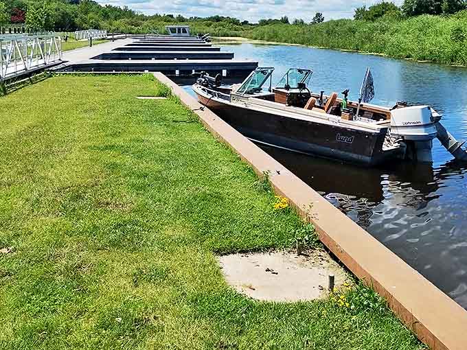 Boat slips await aquatic adventurers, promising access to fishing spots that locals mysteriously describe as "just over there."