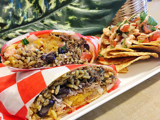 These aren't just burritos &ndash; they're hand-held happiness, where rice, beans, and seasoned meat create a portable feast wrapped in checkered paper.