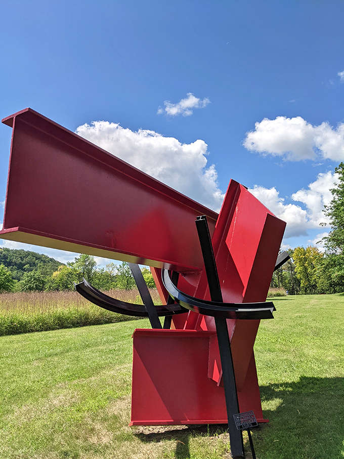 This spider-like metal creation crouches on the lawn, its industrial materials transformed into something organic and almost alive.